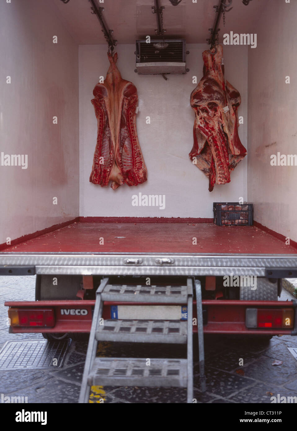 Hanging in delivery truck hi-res stock photography and images - Alamy