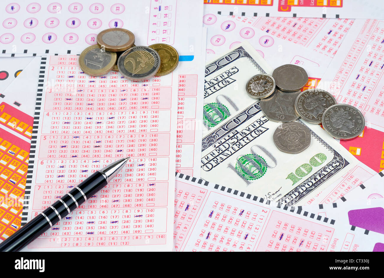 lottery tickets and different types of currency Stock Photo - Alamy
