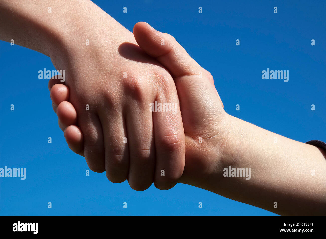 Two Boys Shaking Hands High Resolution Stock Photography and Images - Alamy