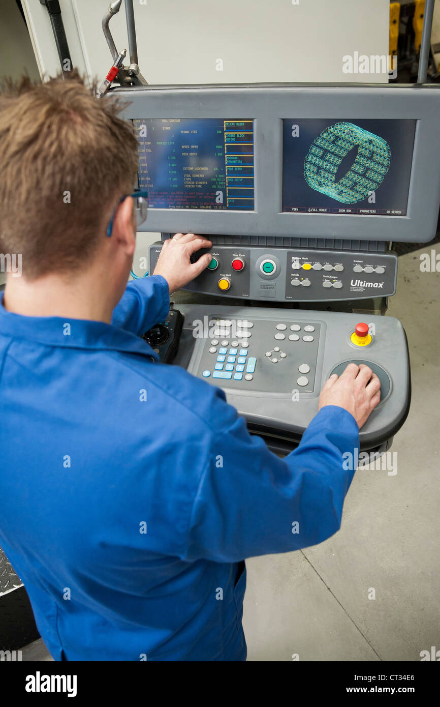 Haas high speed horizontal EDM milling machine with operator Stock ...