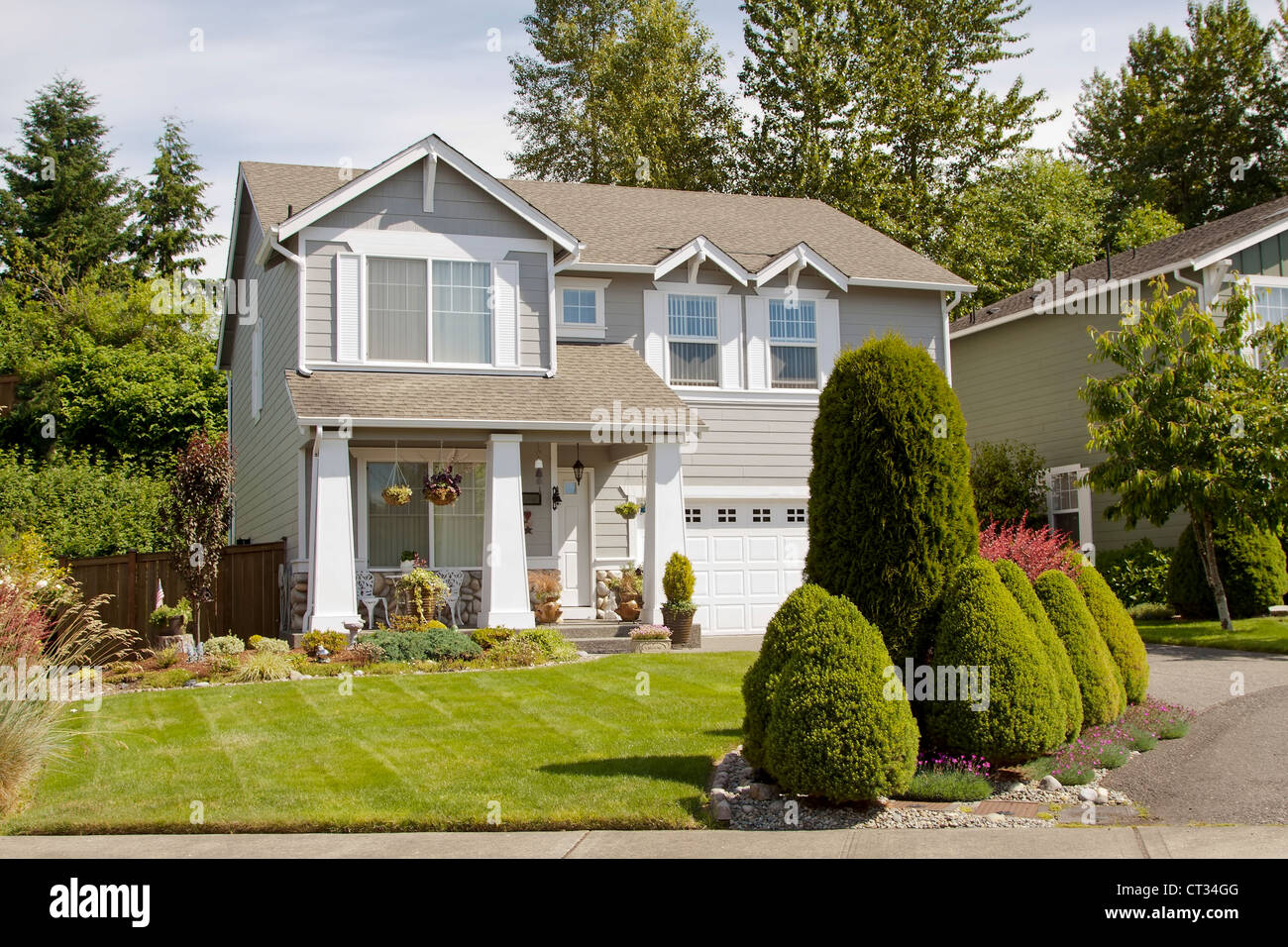 luxury home exterior side view with tree background Stock Photo - Alamy