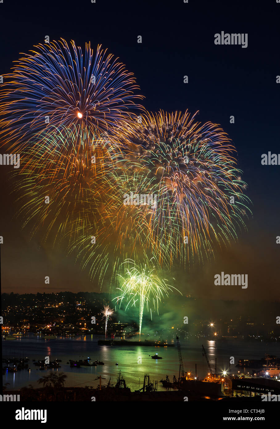 Rapid fire of fireworks off barge on Lake Union Washington Stock Photo ...