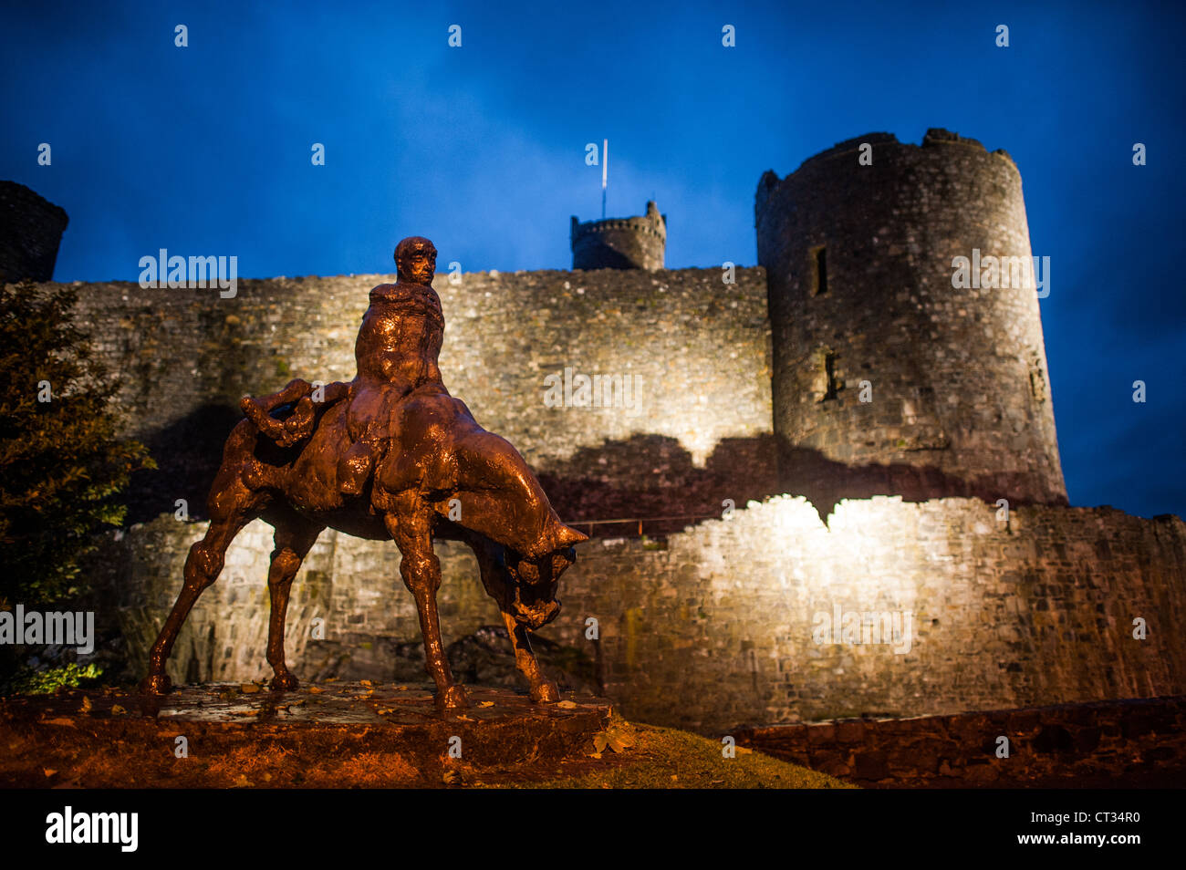 HARLECH, Wales — Harlech Castle stands dramatically illuminated against ...
