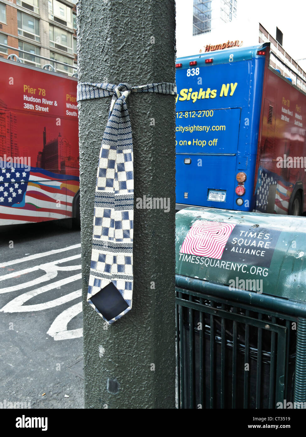 rescued lost man's tie attached to lamp post, possibly picked up off ...