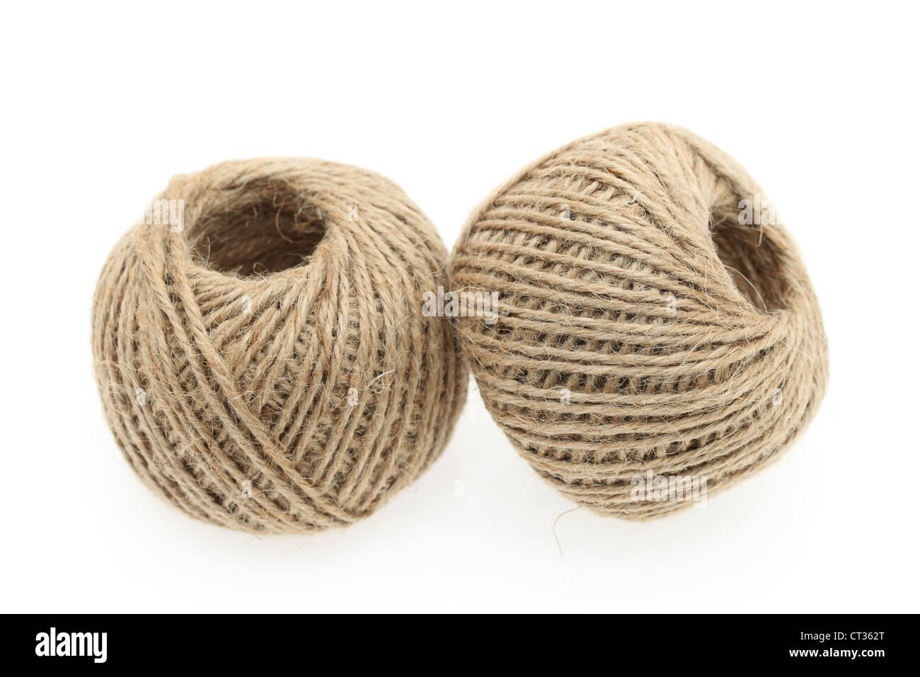 Clew of linen twine on white background Stock Photo - Alamy