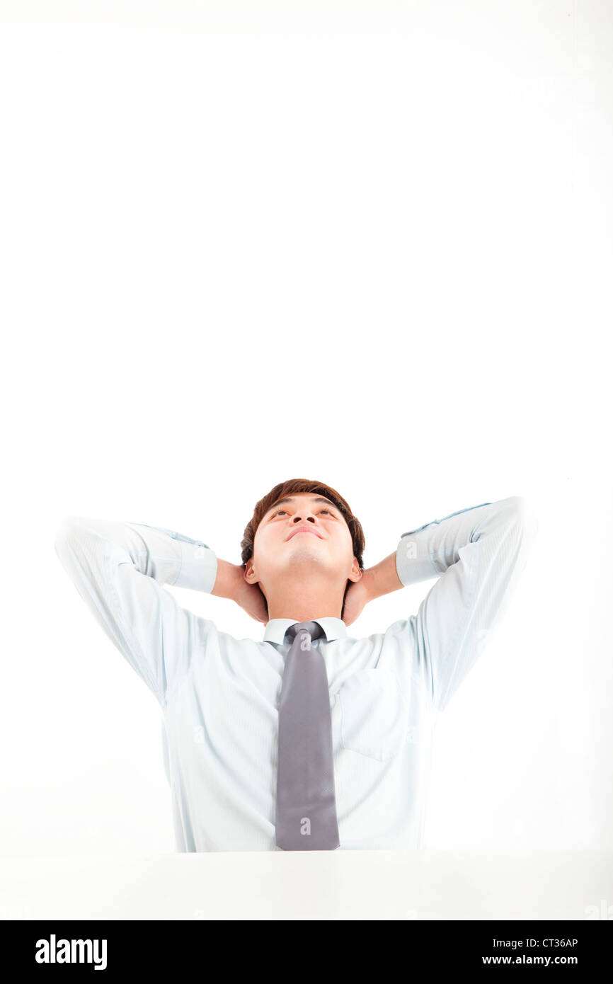 relaxed businessman looking up with white background Stock Photo - Alamy