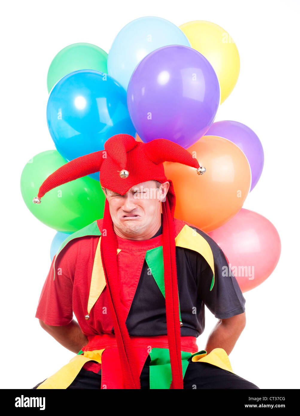 jester - entertaining figure in typical costume with colorful balloons ...