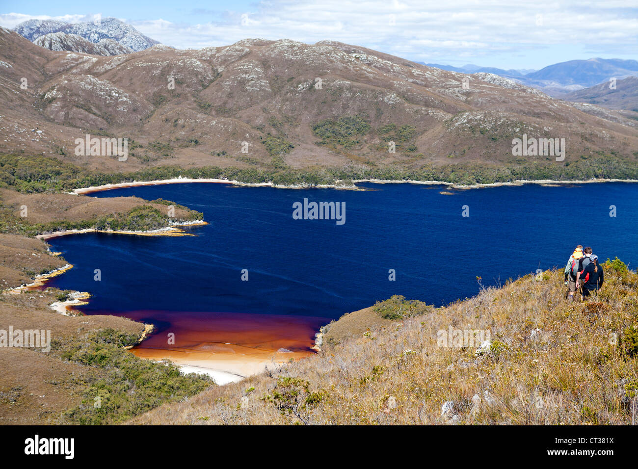 Bushwalkers abve Bramble Cove in Tasmania's Southwest National Park ...