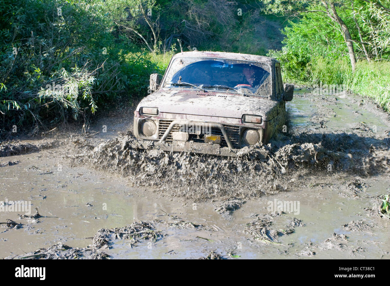 off-road driving on dirt. spray of dirt Stock Photo - Alamy