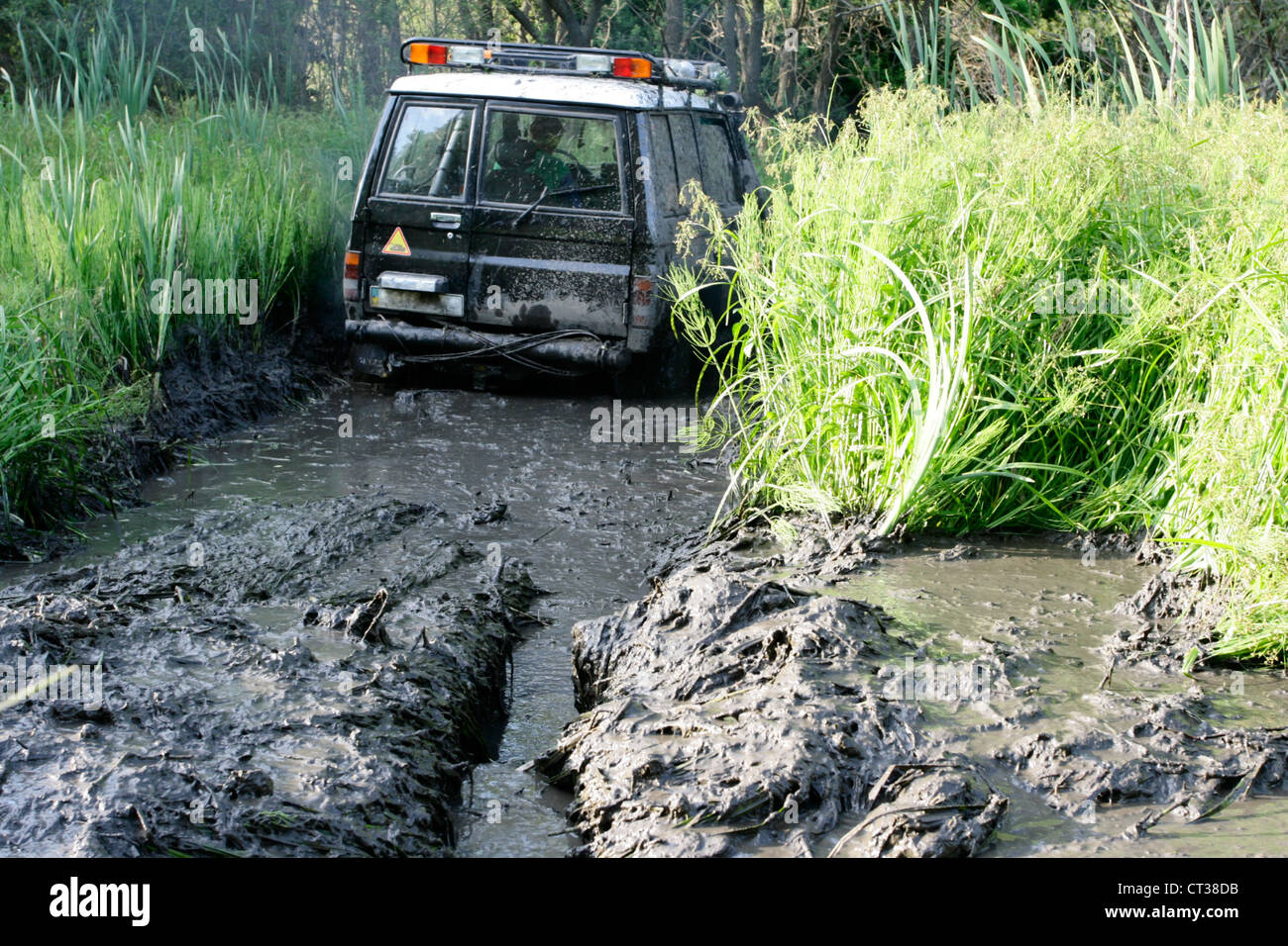 off-road driving on dirt. spray of dirt Stock Photo - Alamy