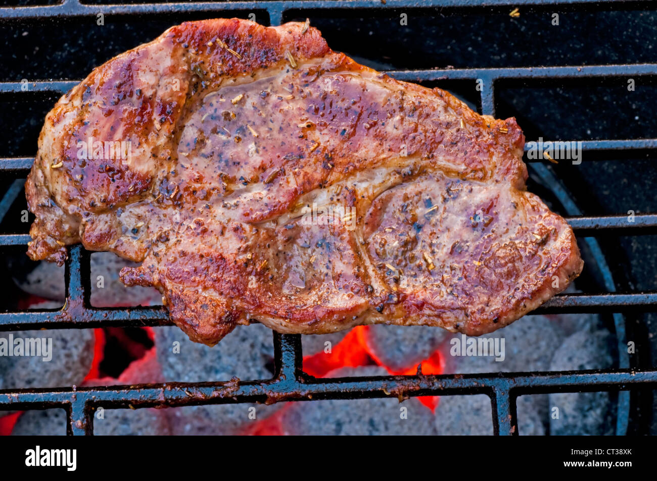 roasted pork neck on barbecue Stock Photo - Alamy