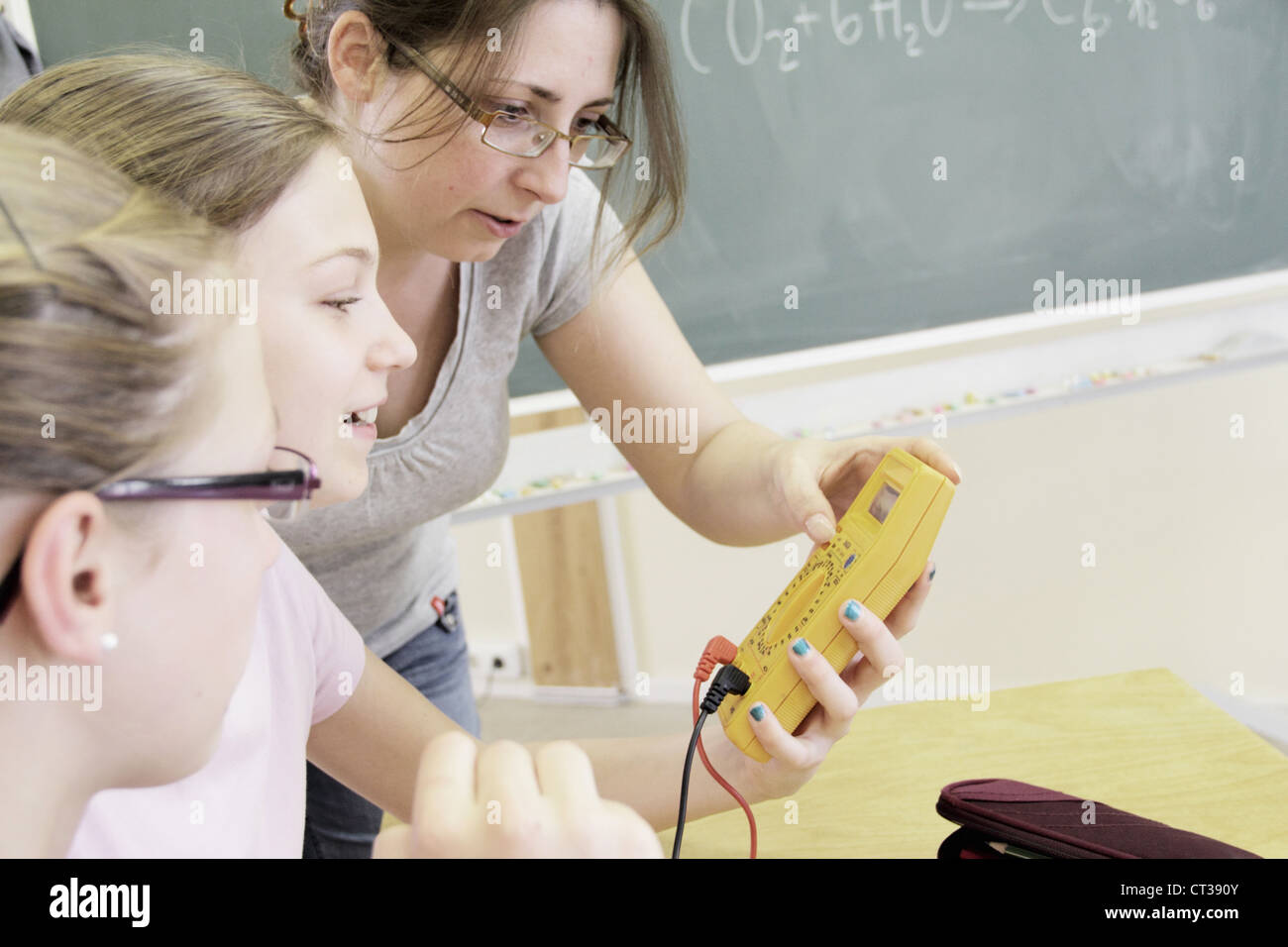 Teacher and students in technology lab Stock Photo - Alamy