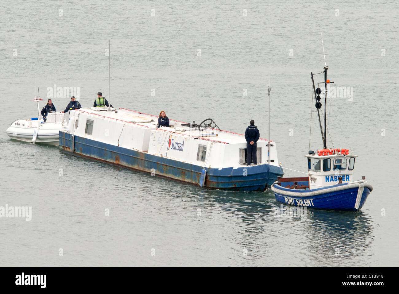 Tug pulling boat hi-res stock photography and images - Alamy