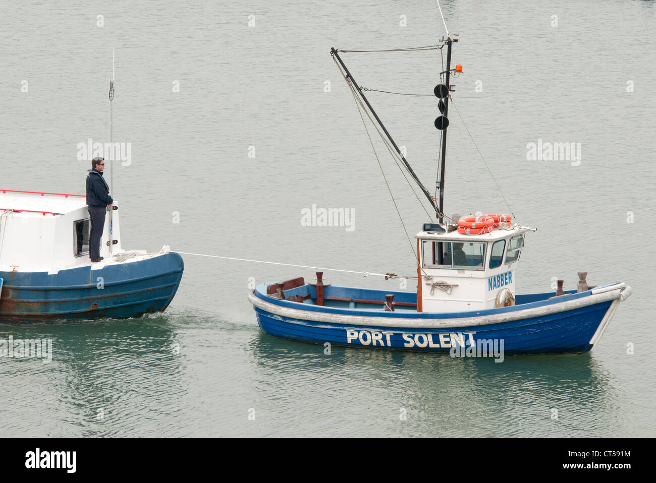 Tug pulling boat hi-res stock photography and images - Alamy