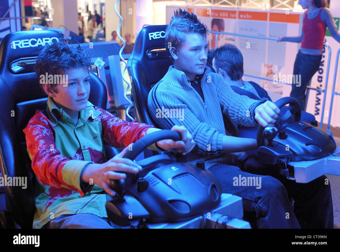 Stuttgart, boys go on a racing simulator Stock Photo - Alamy