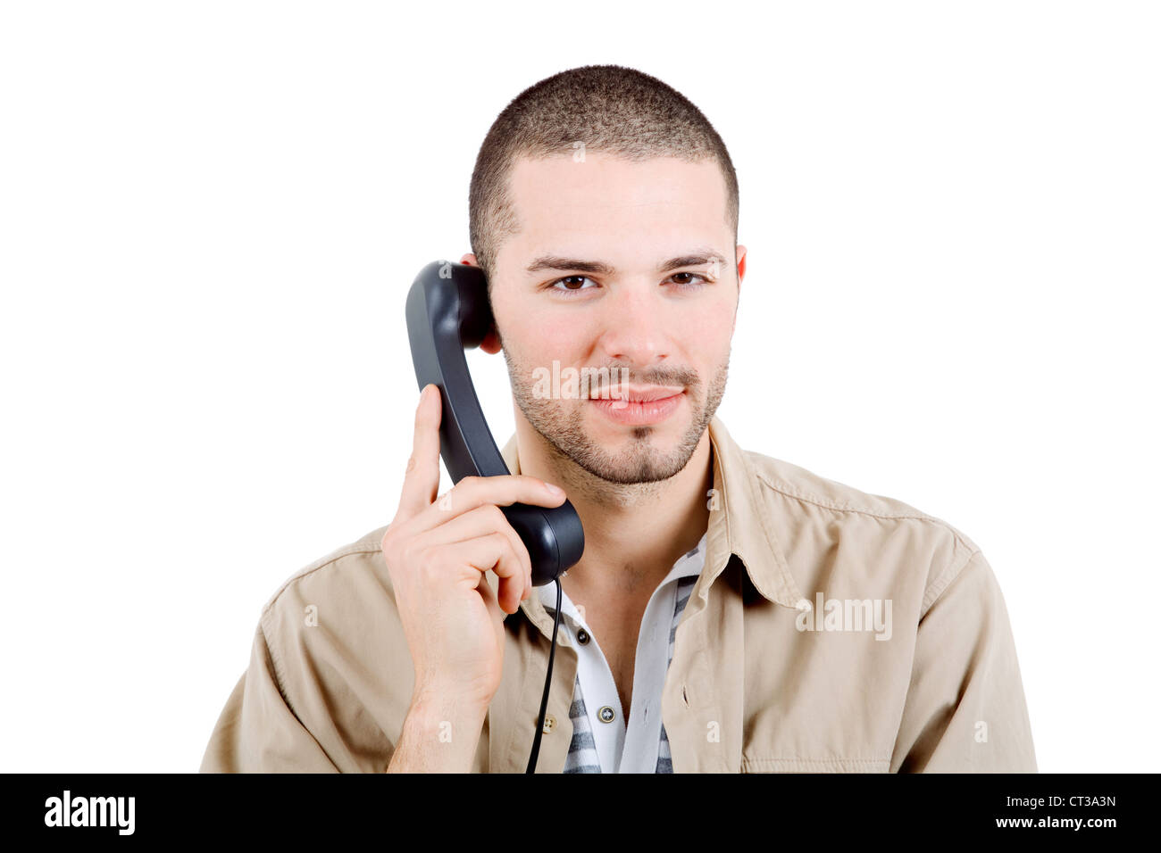 young man with a phone, isolated on white Stock Photo - Alamy