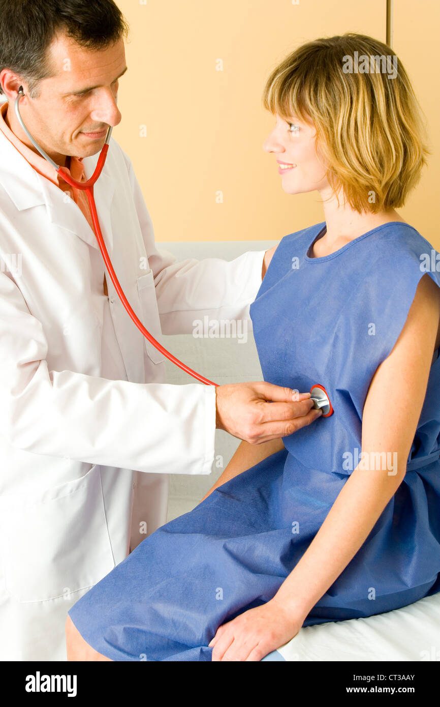 Auscultation woman cardiac hi-res stock photography and images - Alamy