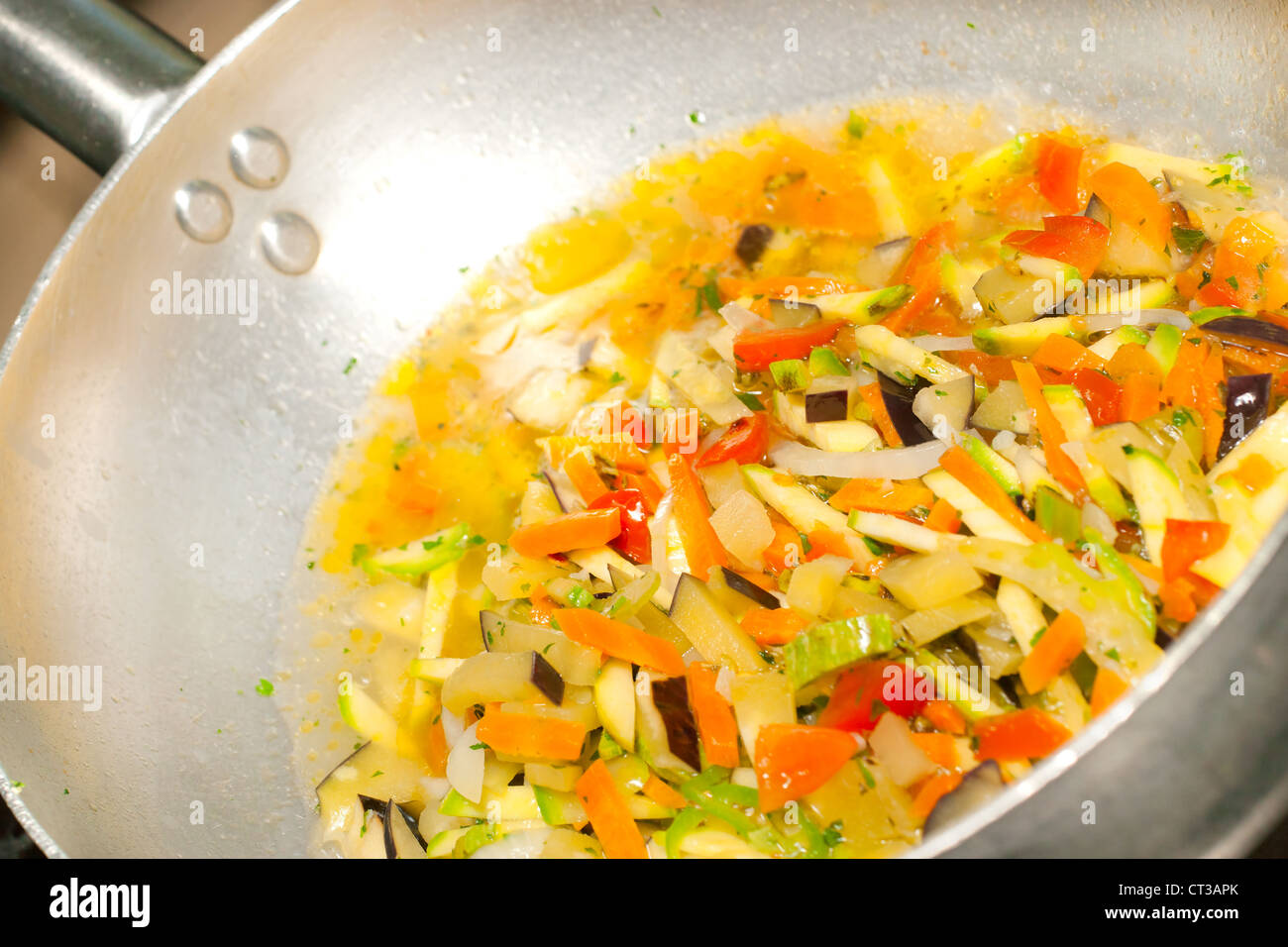 Fresh mixed vegetables in a Frying Pan Stock Photo - Alamy