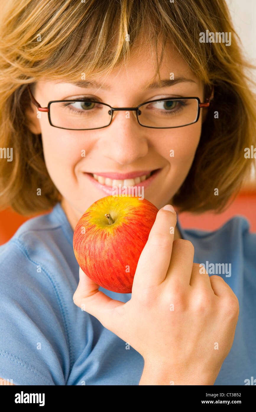 WOMAN EATING FRUIT Stock Photo - Alamy