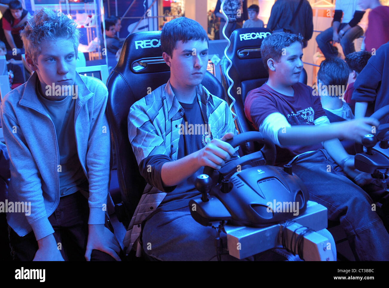Stuttgart, boys go on a racing simulator Stock Photo - Alamy