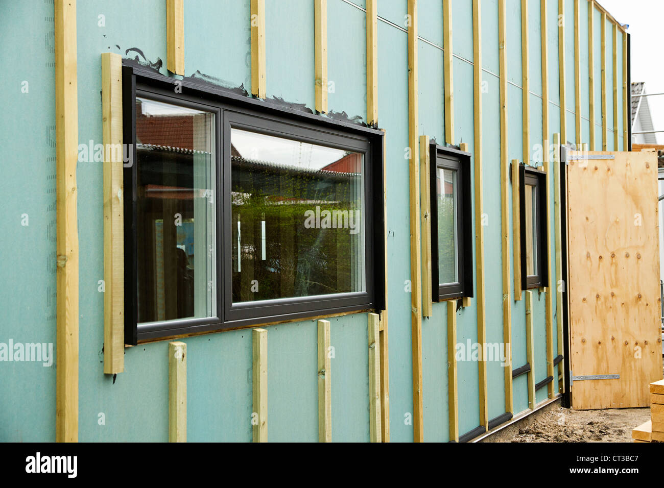 Windows of building under construction Stock Photo - Alamy