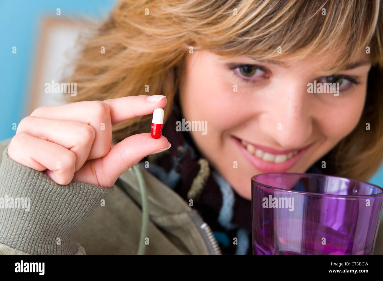 WOMAN TAKING MEDICATION Stock Photo - Alamy