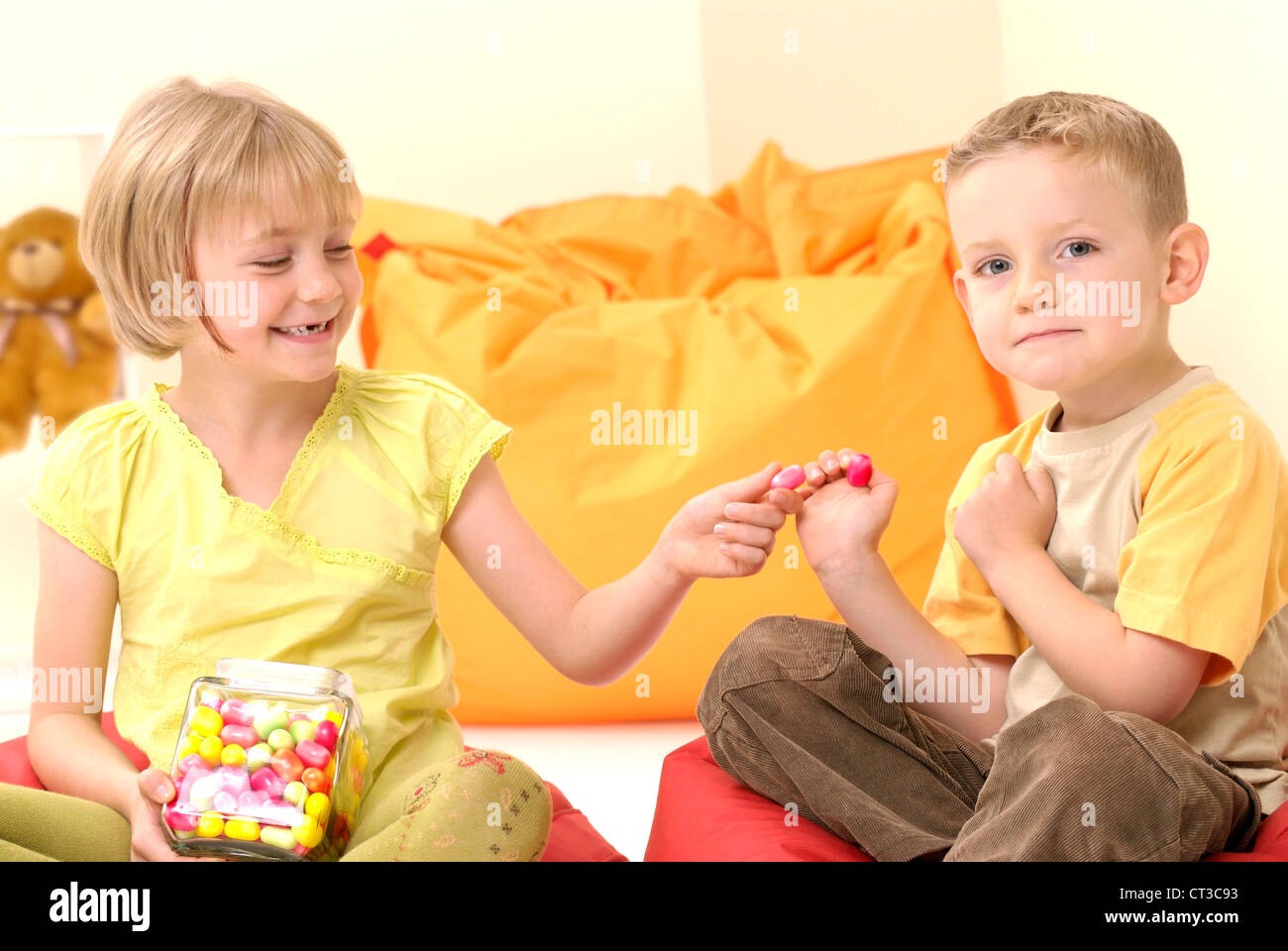 CHILD EATING SWEETS Stock Photo - Alamy