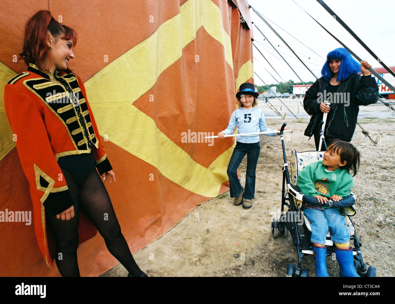 Circus artists and children at the circus tent Stock Photo - Alamy