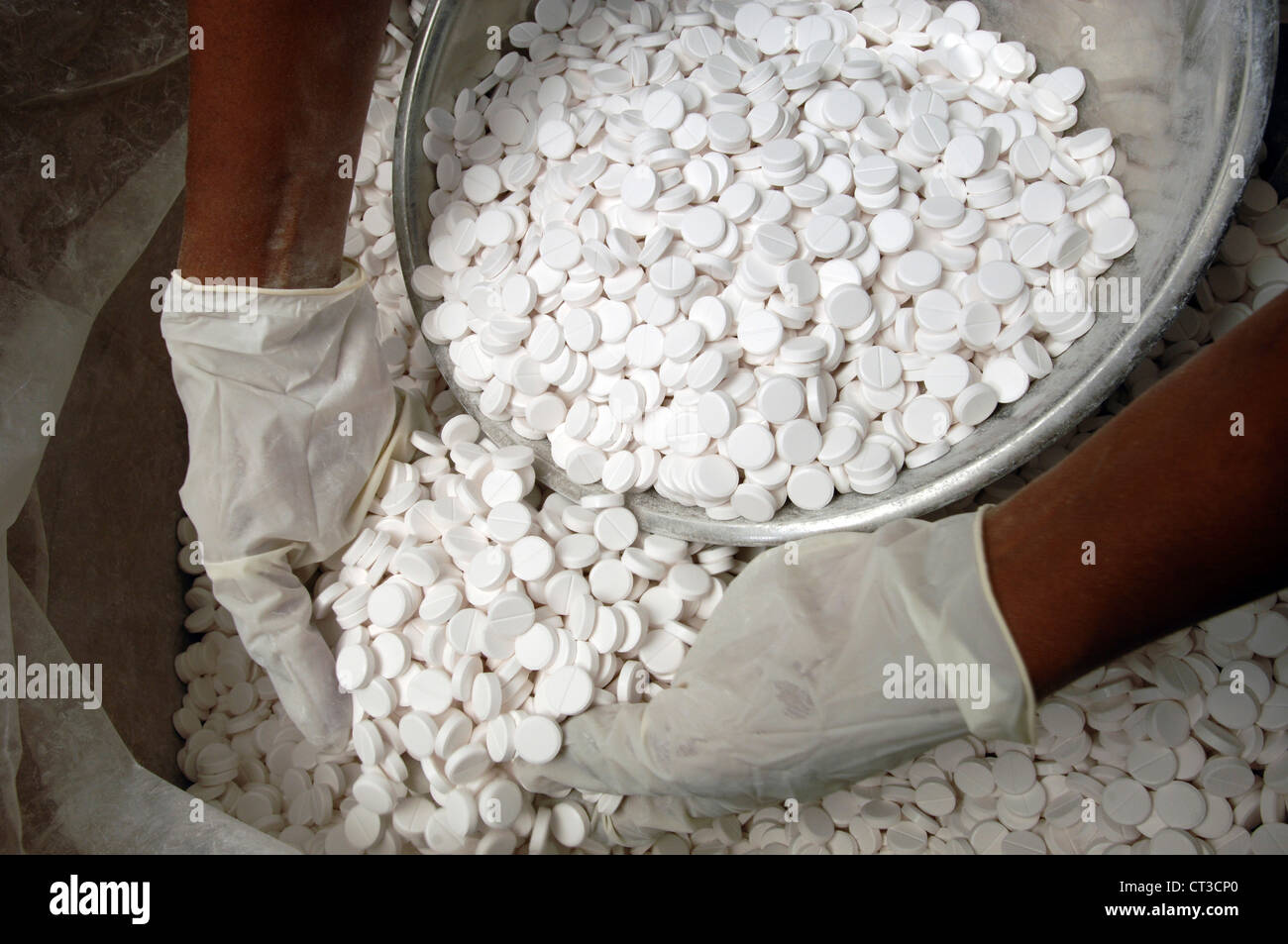 Newly produced while tablets being poured into a container Stock Photo ...