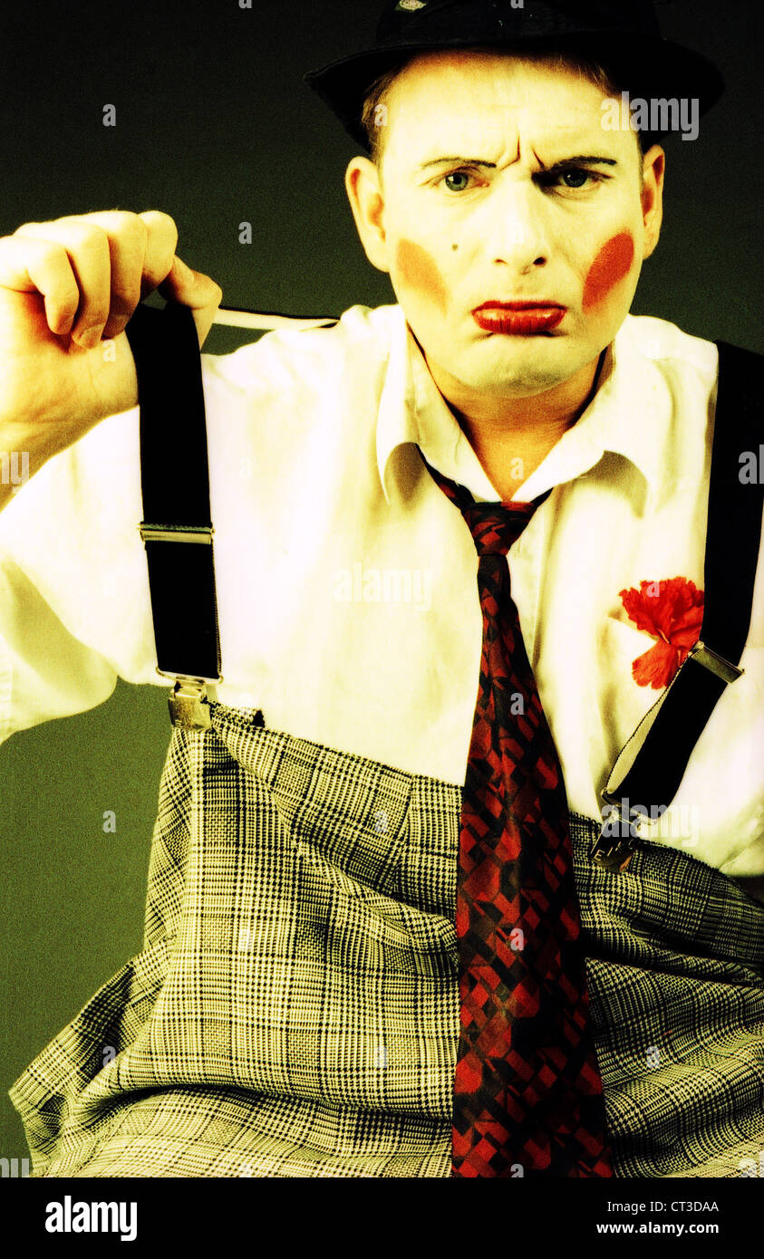 Berlin, a clown puts on his suspenders Stock Photo - Alamy