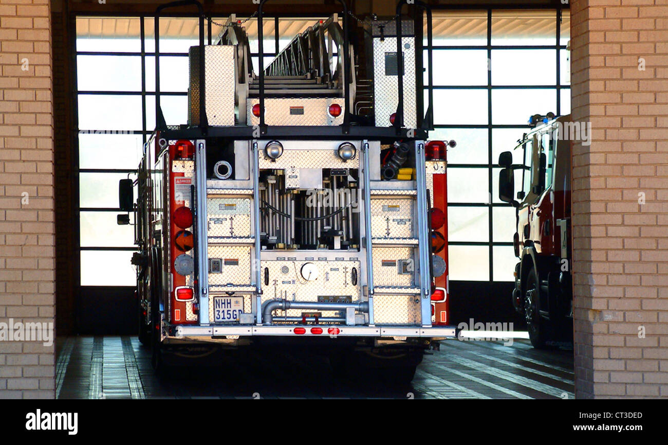 The rear of a Fire Engine parked in a Fire Station Stock Photo - Alamy
