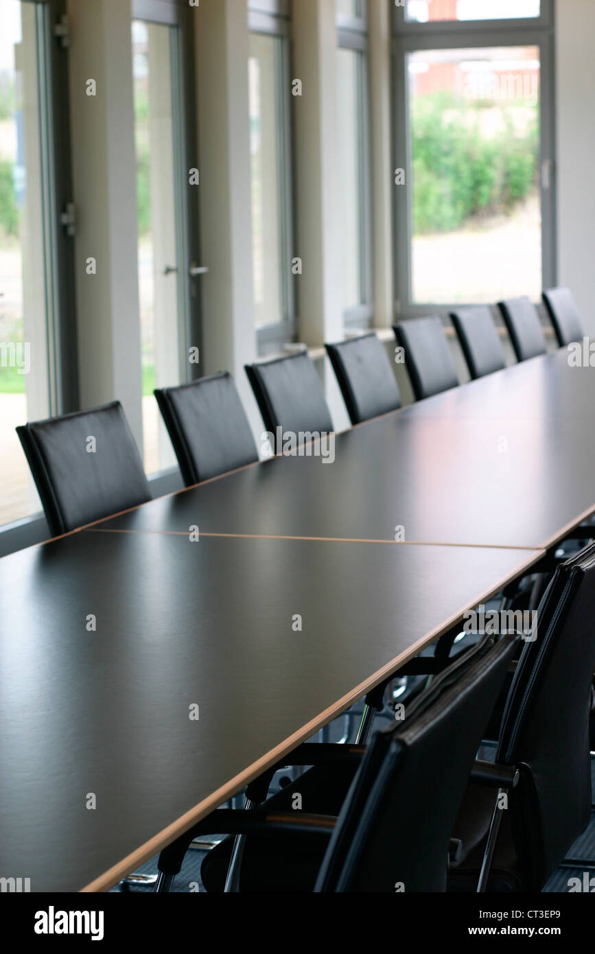 Conference room with black chairs and tables Stock Photo - Alamy