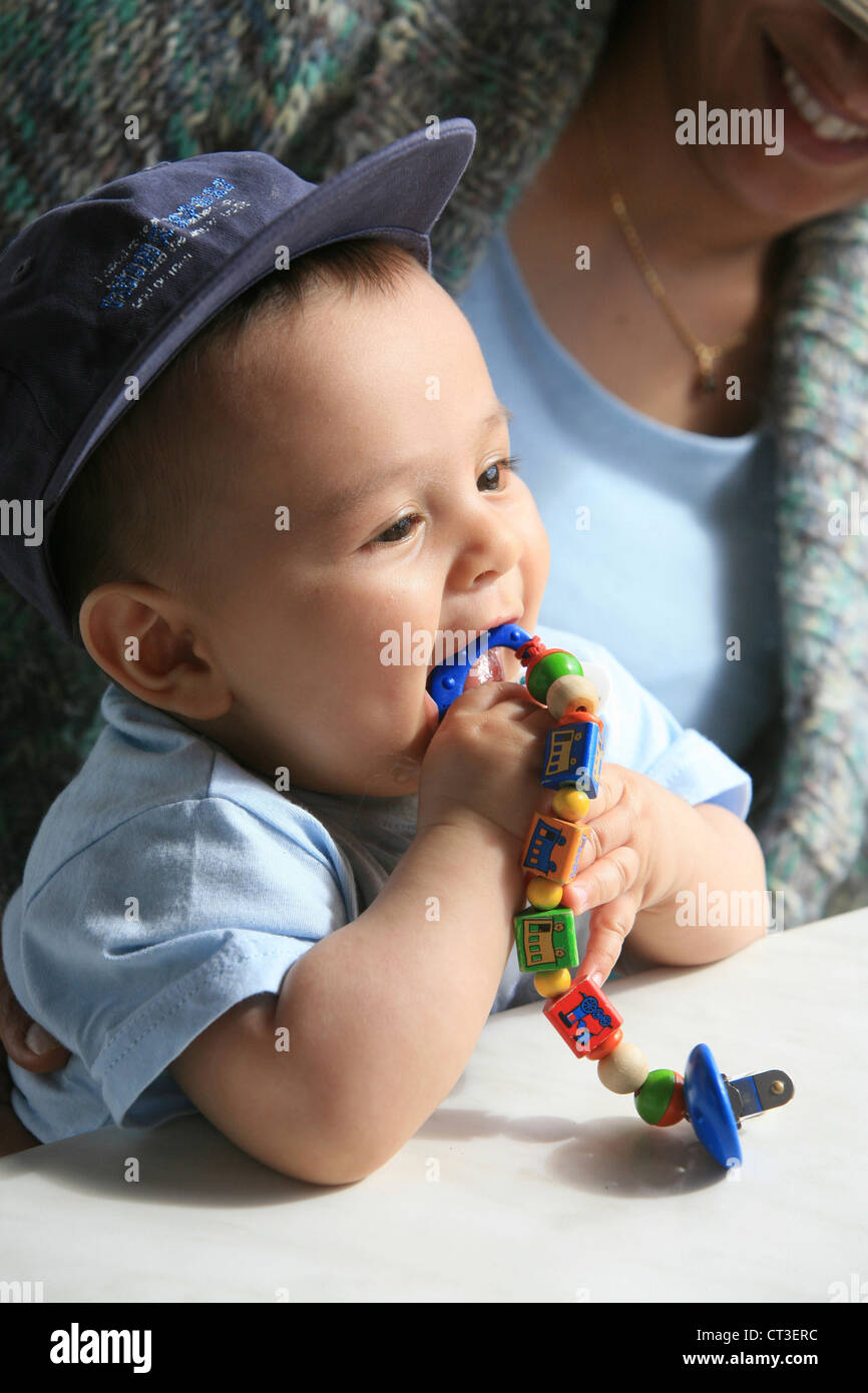 Baby sucking hand smiling hi-res stock photography and images - Alamy