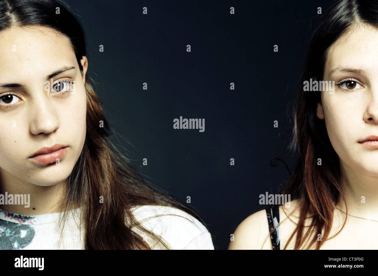 Two young girls look sad Stock Photo - Alamy