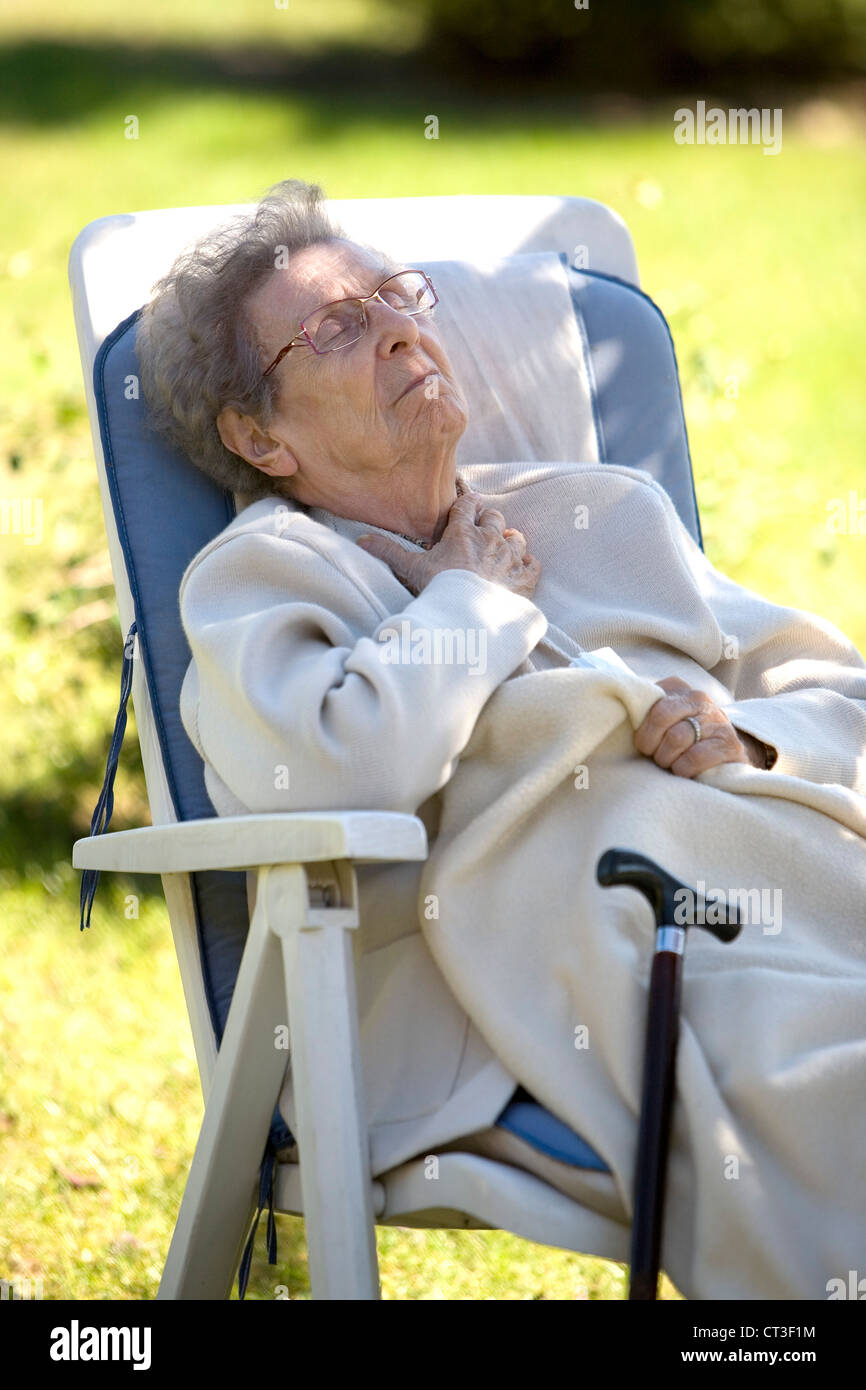 ELDERLY PERSON RESTING Stock Photo - Alamy