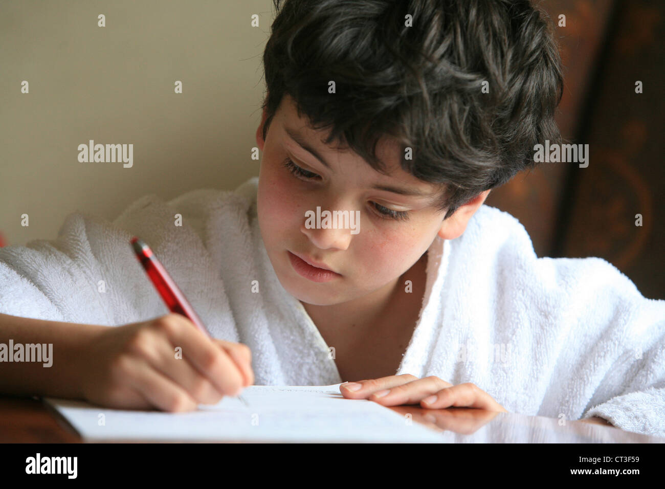 CHILD DOING HOMEWORK Stock Photo - Alamy