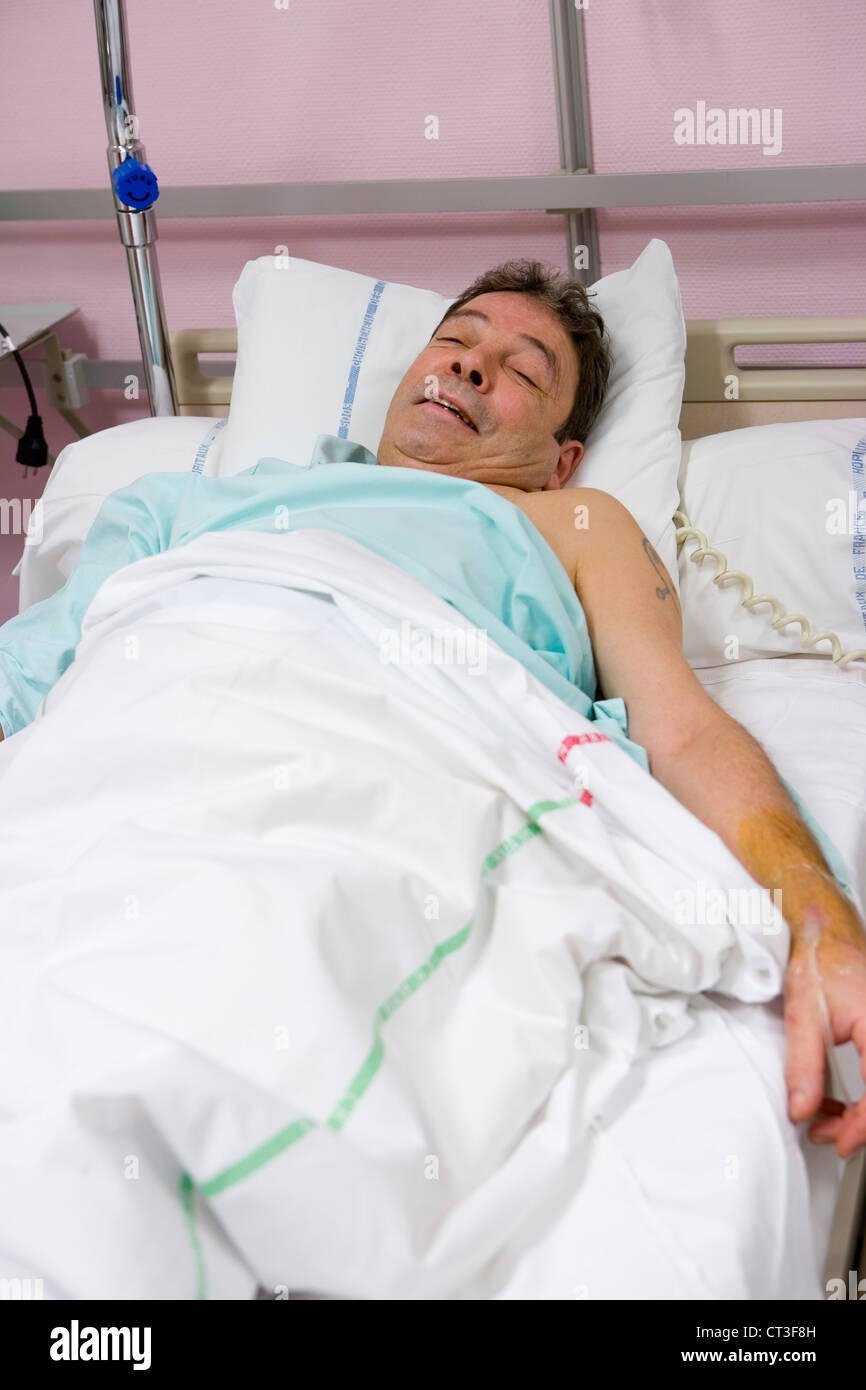 MAN HOSPITAL PATIENT Stock Photo - Alamy