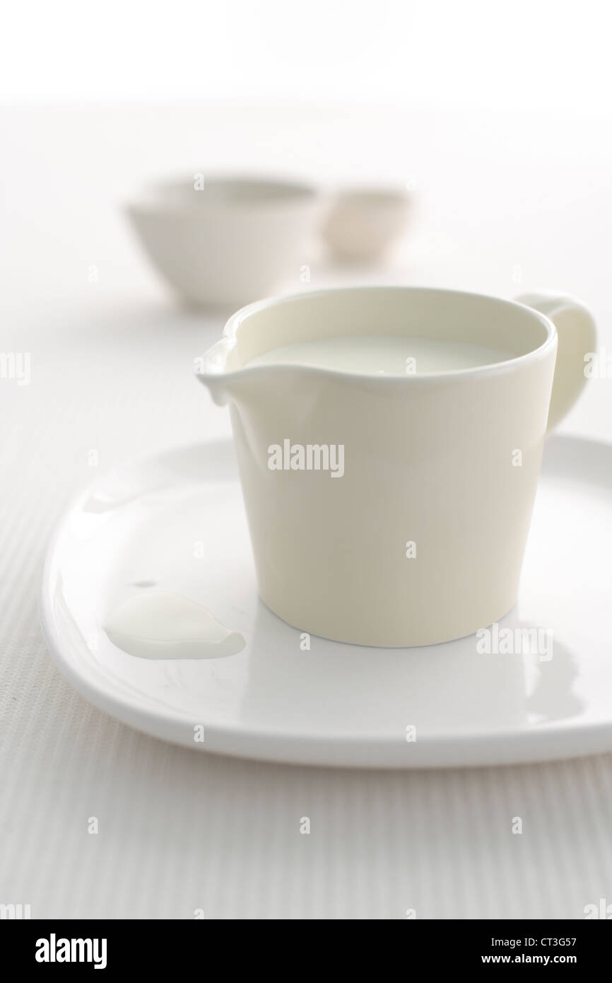 Close up of pitcher of milk Stock Photo - Alamy