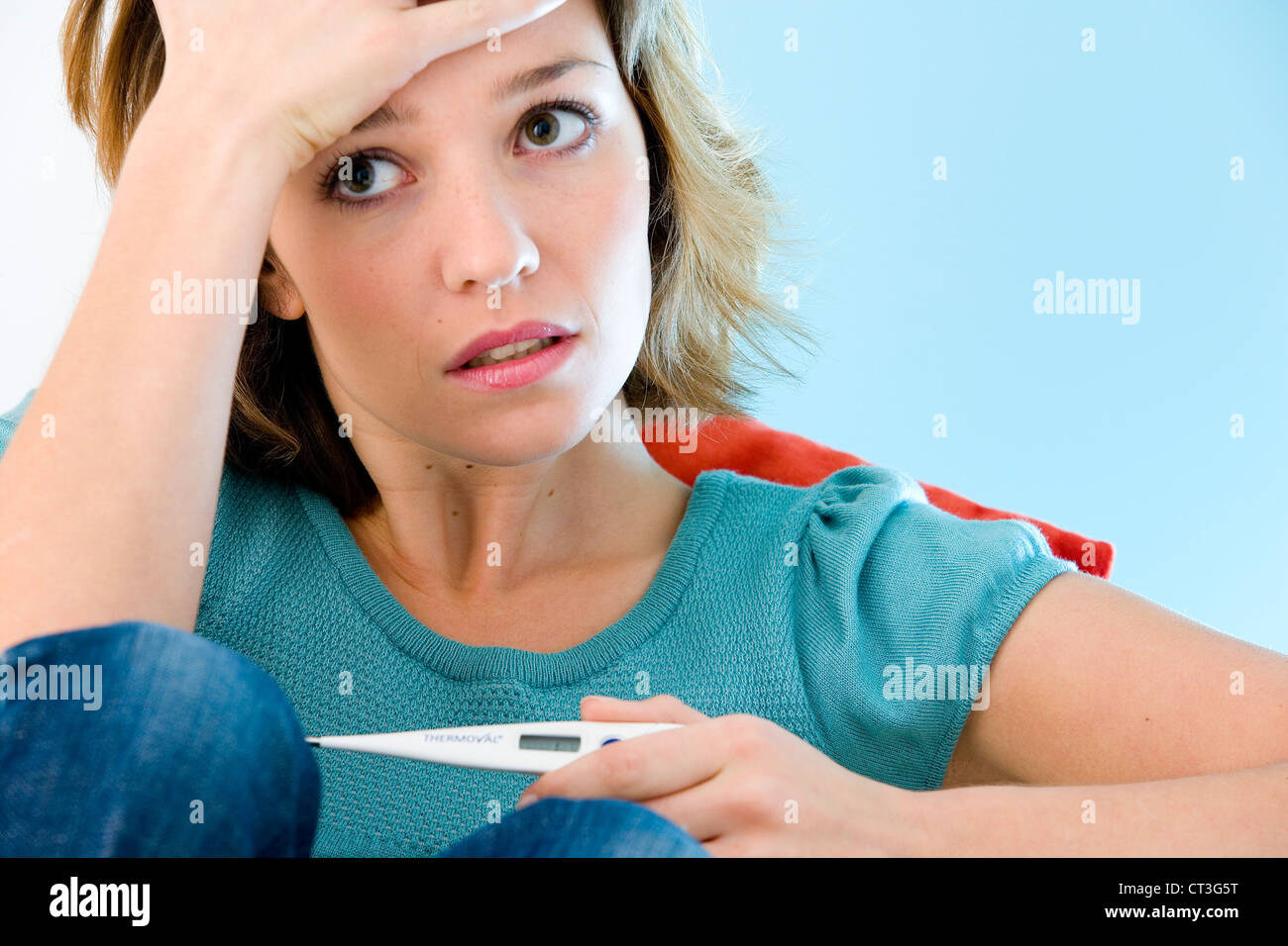 WOMAN WITH FEVER Stock Photo - Alamy
