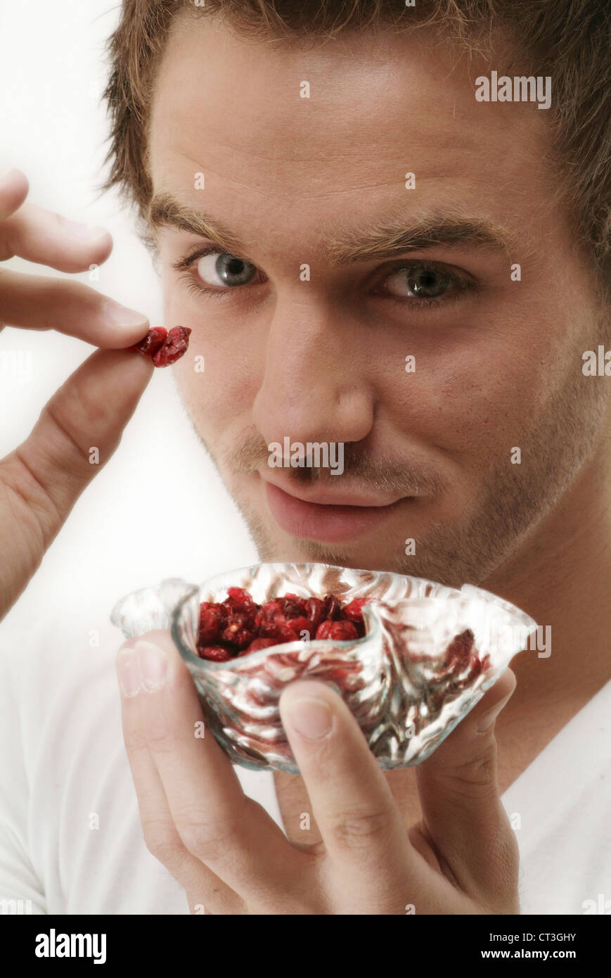 MAN EATING FRUIT Stock Photo - Alamy