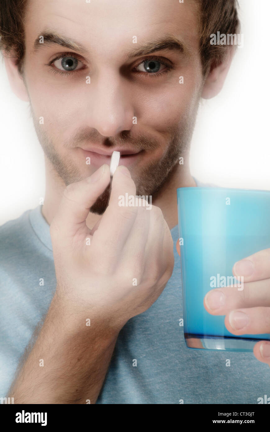 MAN TAKING MEDICATION Stock Photo - Alamy