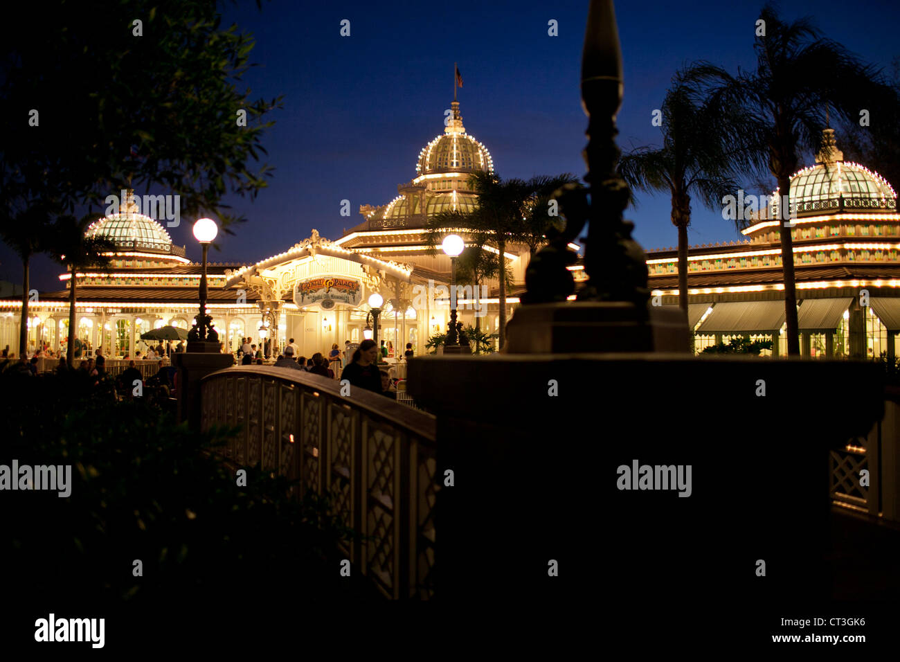 The Crystal Palace illuminated at night in Magic Kingdom, Disney World ...