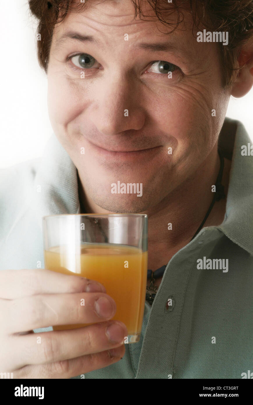 MAN WITH COLD DRINK Stock Photo - Alamy