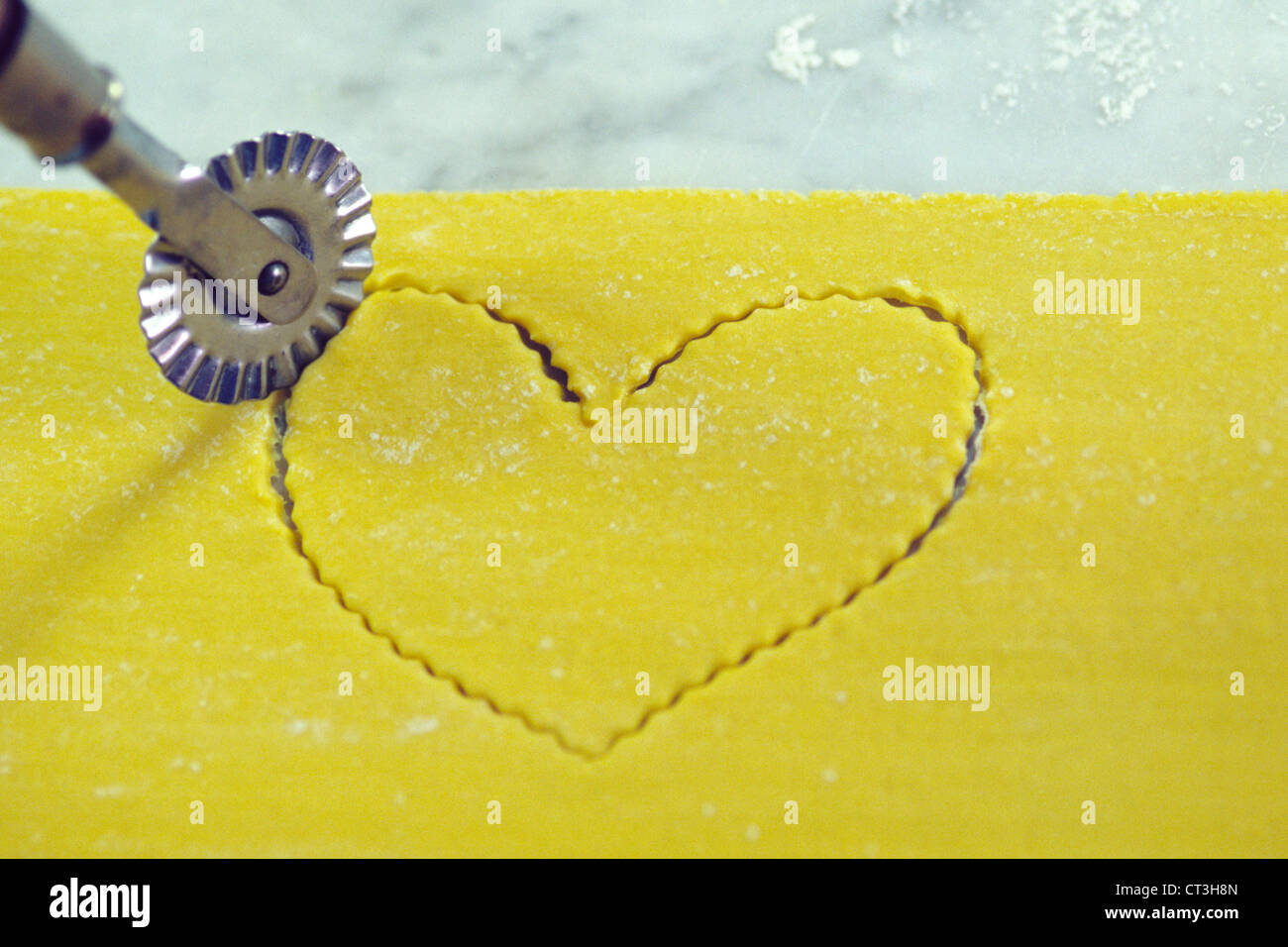 Making Heart Shape on Fresh Pasta Stock Photo - Alamy