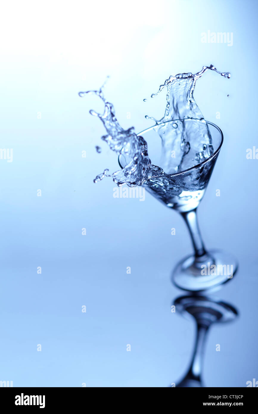 Close up of cocktail spilling Stock Photo - Alamy