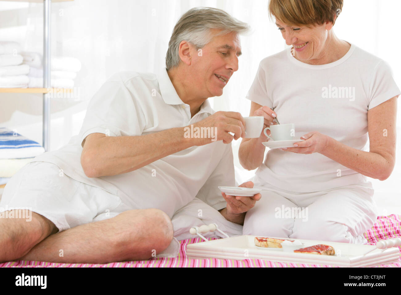 ELDERLY PERSON EATING BREAKFAST Stock Photo - Alamy
