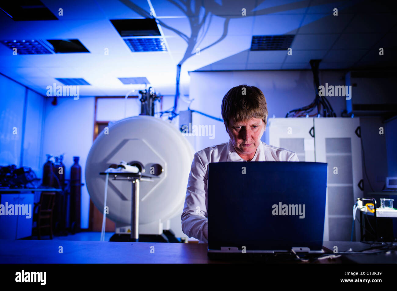 Scientist using computer in lab Stock Photo - Alamy