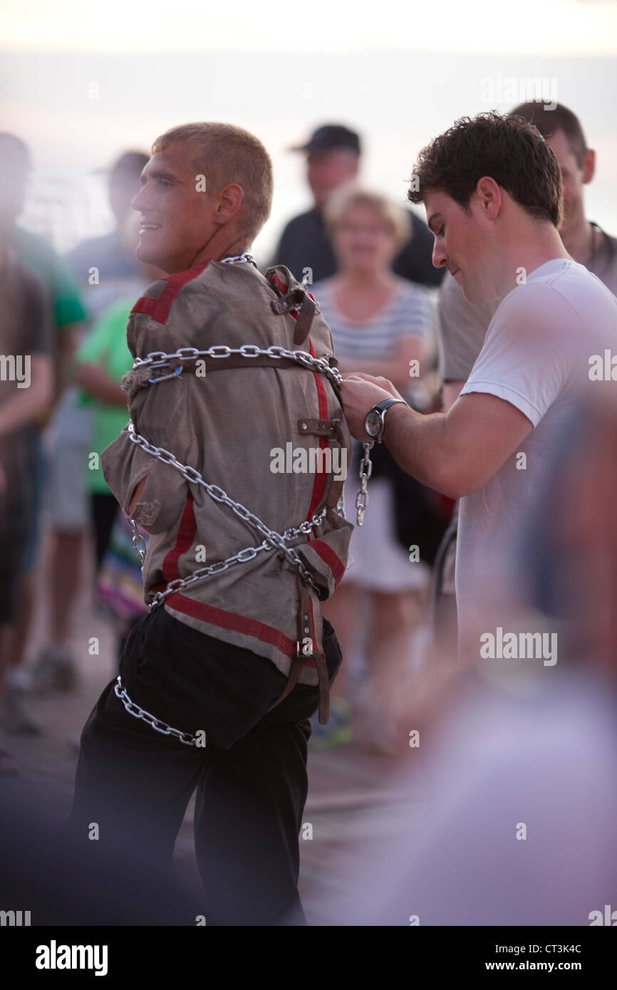 Chained man hi-res stock photography and images - Alamy