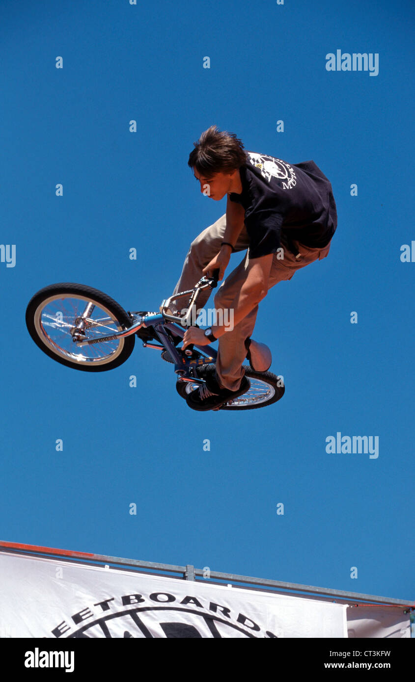 Youth BMX rider flies through the air Stock Photo - Alamy