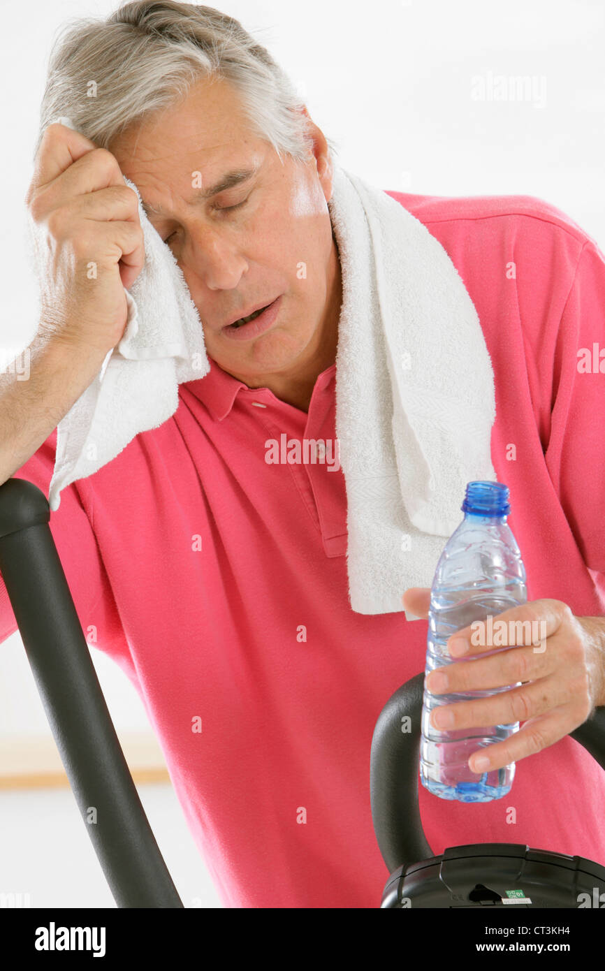 TIRED ELDERLY PERSON Stock Photo - Alamy